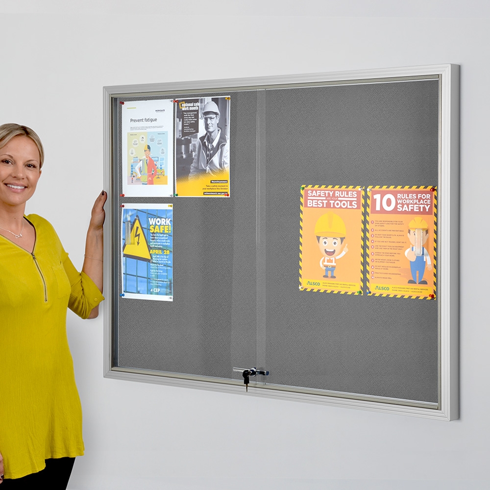 A Fabric Pinboard has a Light Grey Backing Surrounded by a Silver Frame!