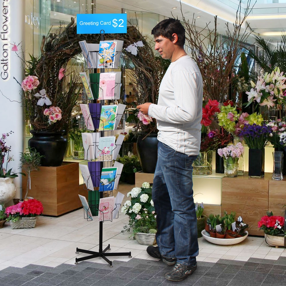 This Brochure Dispenser is a Tiered, Rotating Rack!